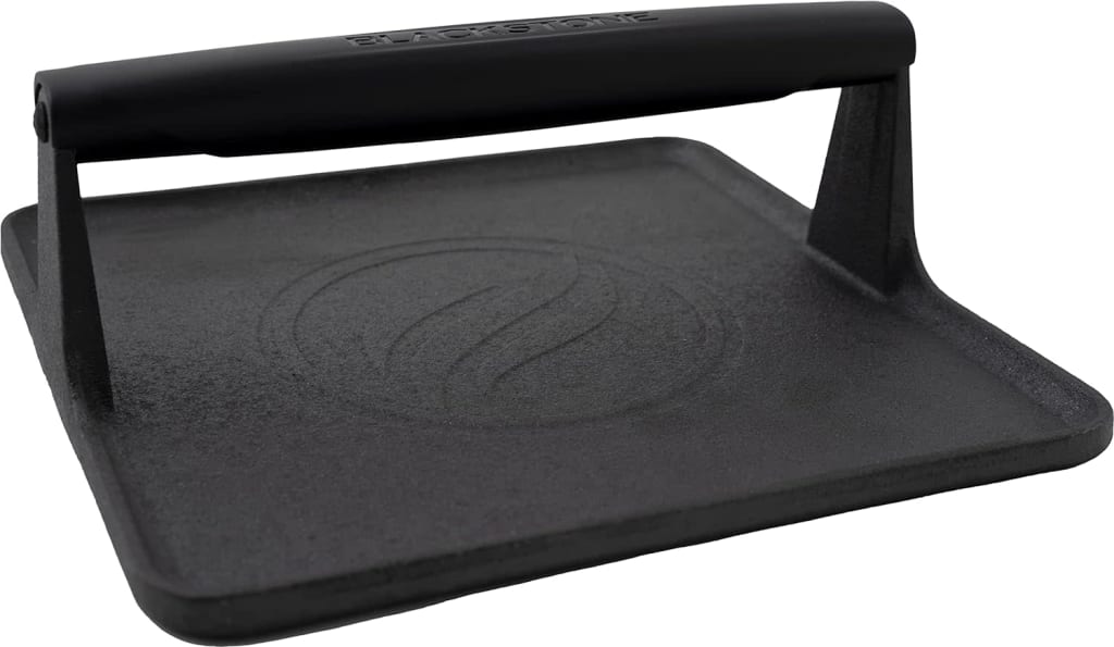 Blackstone Pre-Seasoned Cast Iron Griddle Press for $28 - 5554